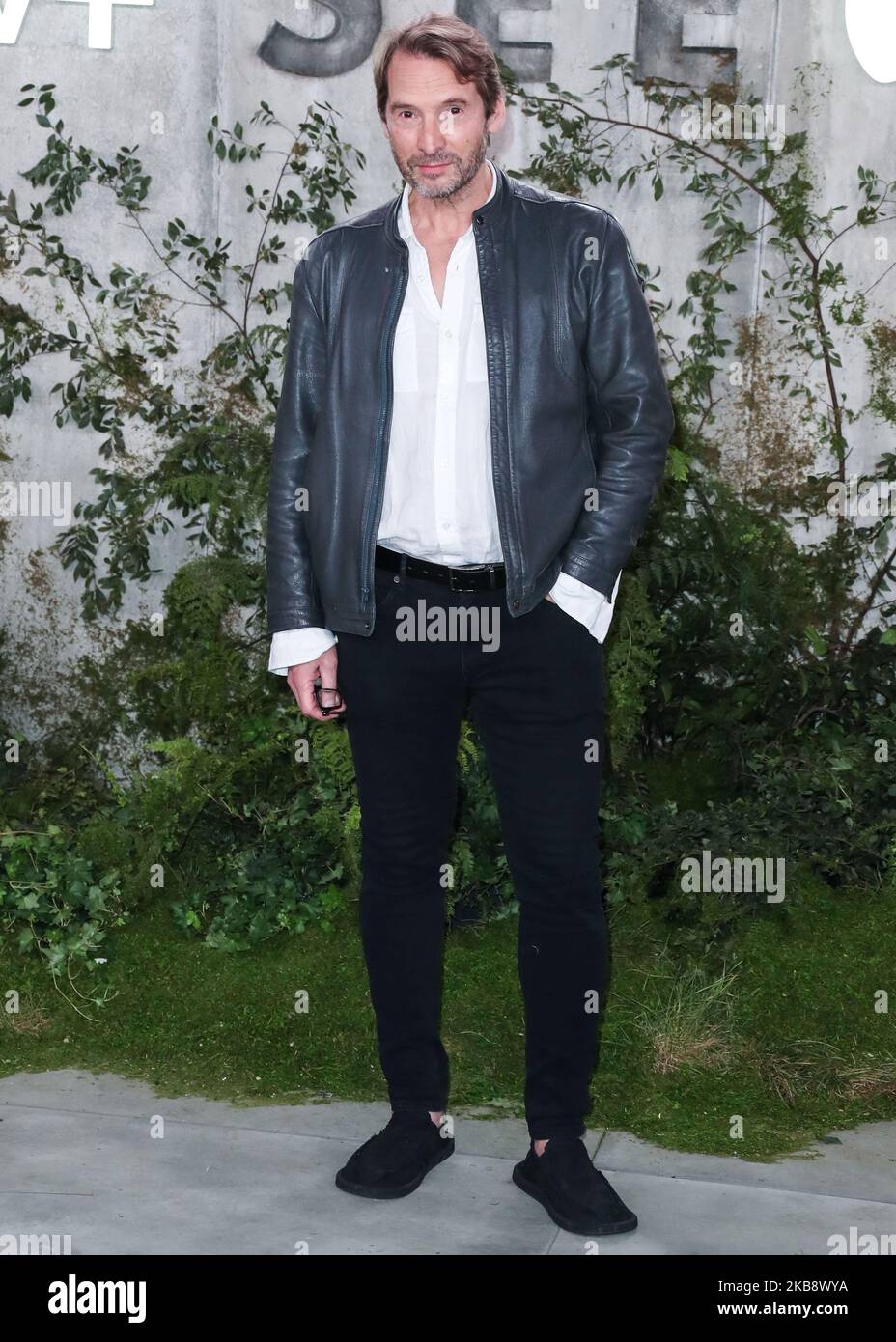 WESTWOOD, LOS ANGELES, CALIFORNIA, USA - OCTOBER 21: Actor Adrian Hough ...