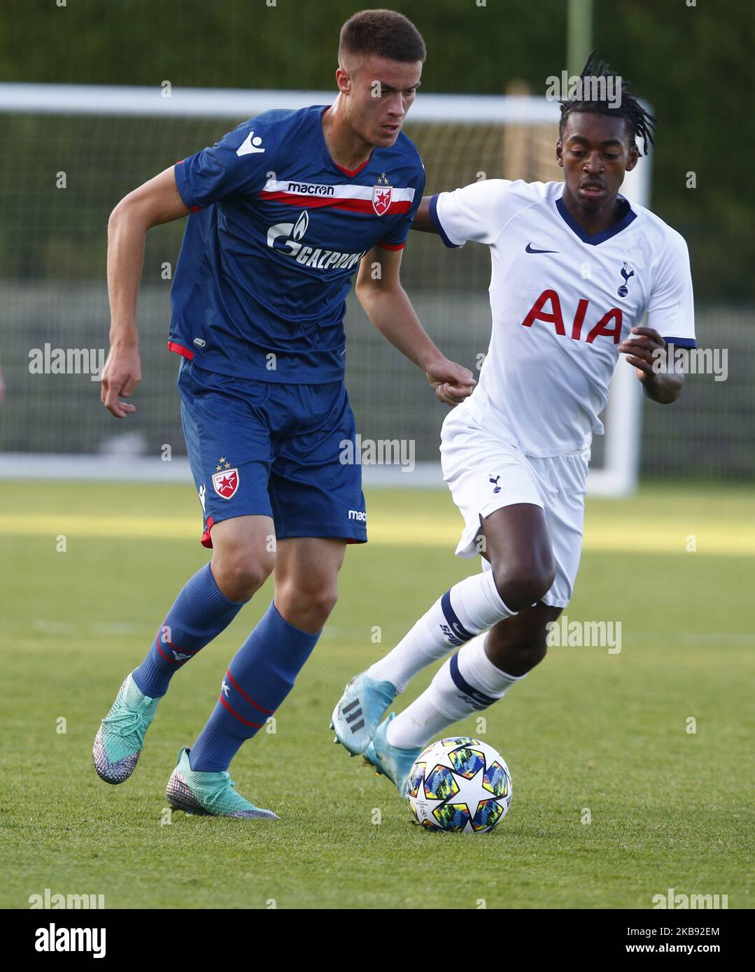 L-R Aleksandar Llic of Crvena zvezda ( Red Star Belgrade) and Paris Maghoma Edmond of Tottenham ...