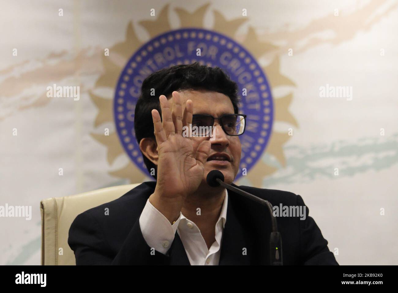 Former Indian cricketer Sourav Ganguly reacts during a press conference at the Board of Control ...