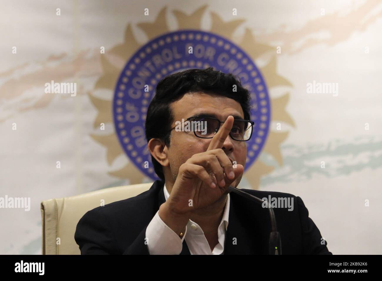 Former Indian cricketer Sourav Ganguly reacts during a press conference at the Board of Control ...