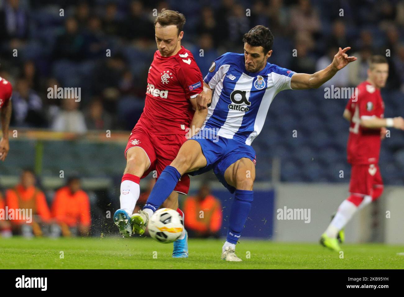 Paulo Barker Porto's Spanish Defender Ivan Marcano (R) Vies With