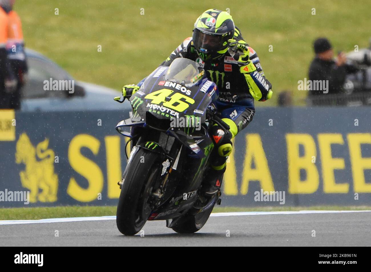Valentino Rossi of Italy rides the Monster Energy Yamaha MotoGP bike ...