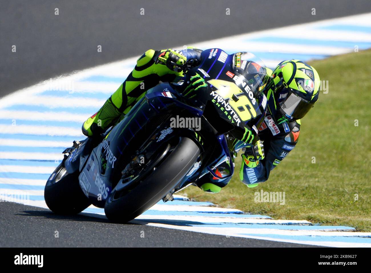 Valentino Rossi of Italy rides the Monster Energy Yamaha MotoGP bike ...