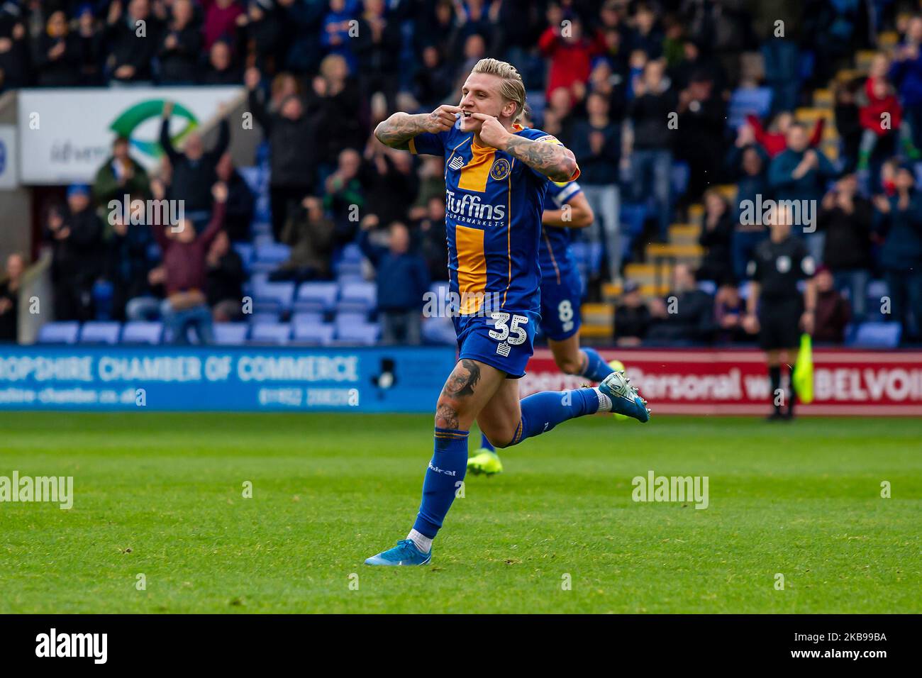 Jason Cummings of Shrewsbury Town celebrates after scoring the opening ...