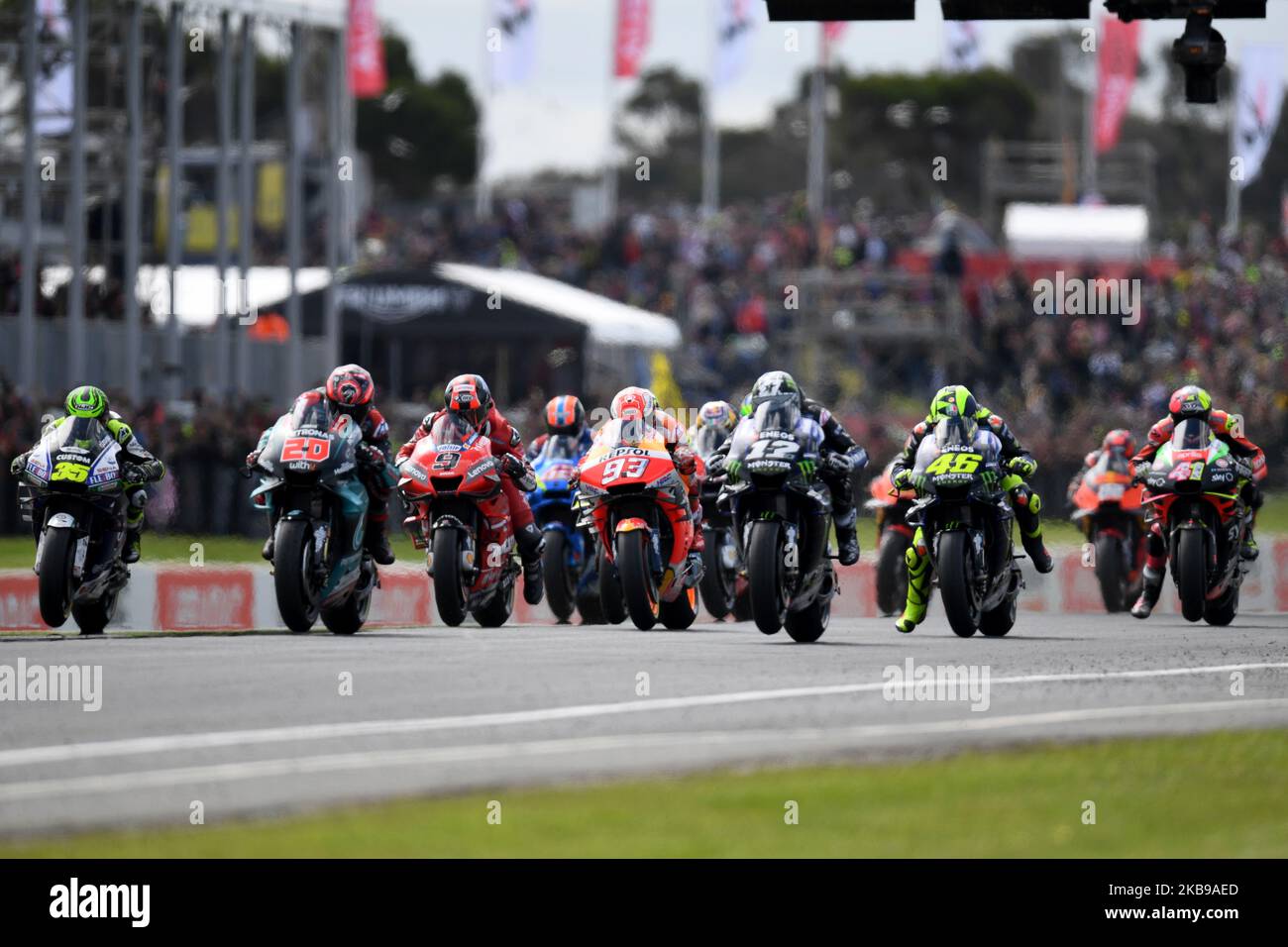 Riders battle for position as the Australian MotoGP race begins at the ...