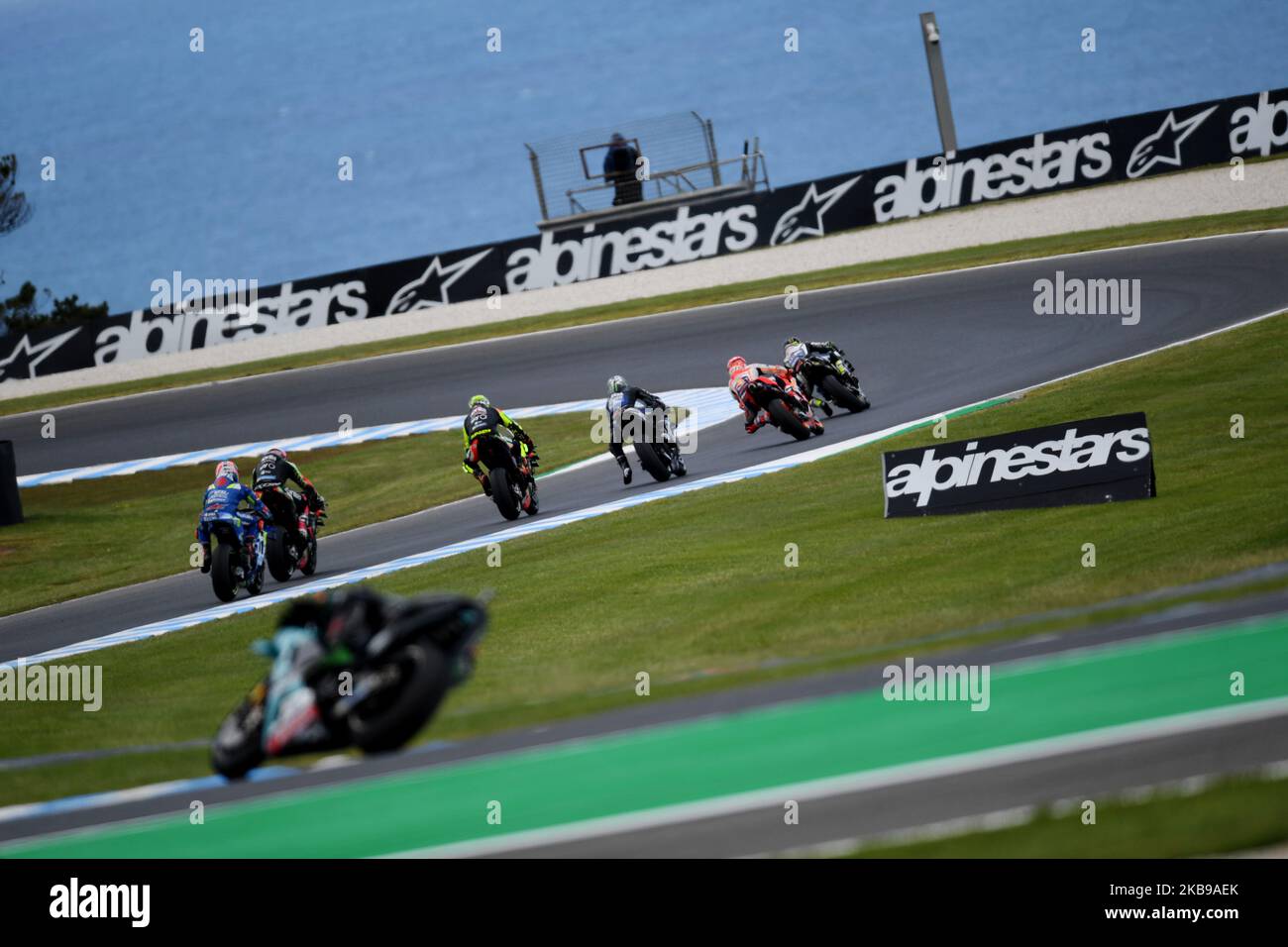 Riders battle for position during the Australian MotoGP race at the ...