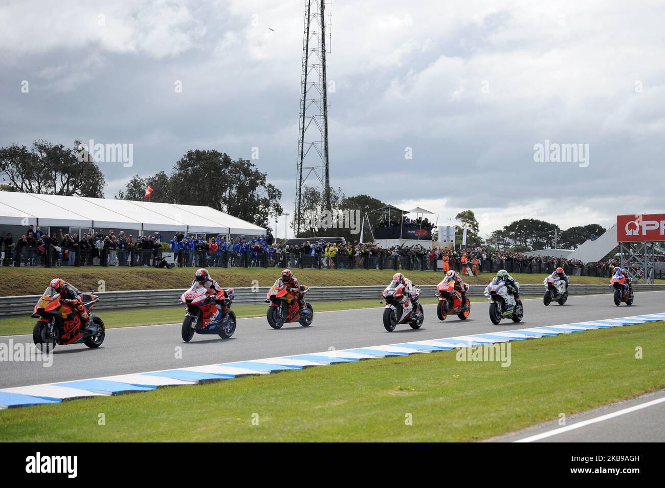 Riders battle for position as the Australian MotoGP race begins at the ...