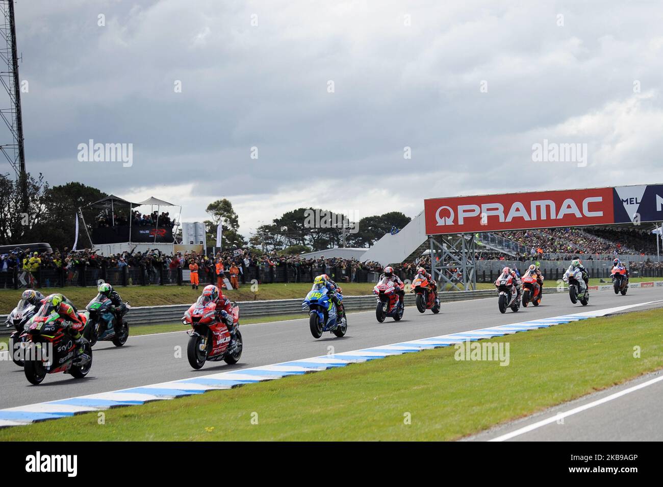 Riders battle for position as the Australian MotoGP race begins at the ...