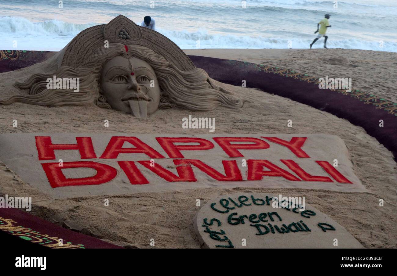 A festival of lights ''Diwali' sand sculpture is seen at the Bay of ...