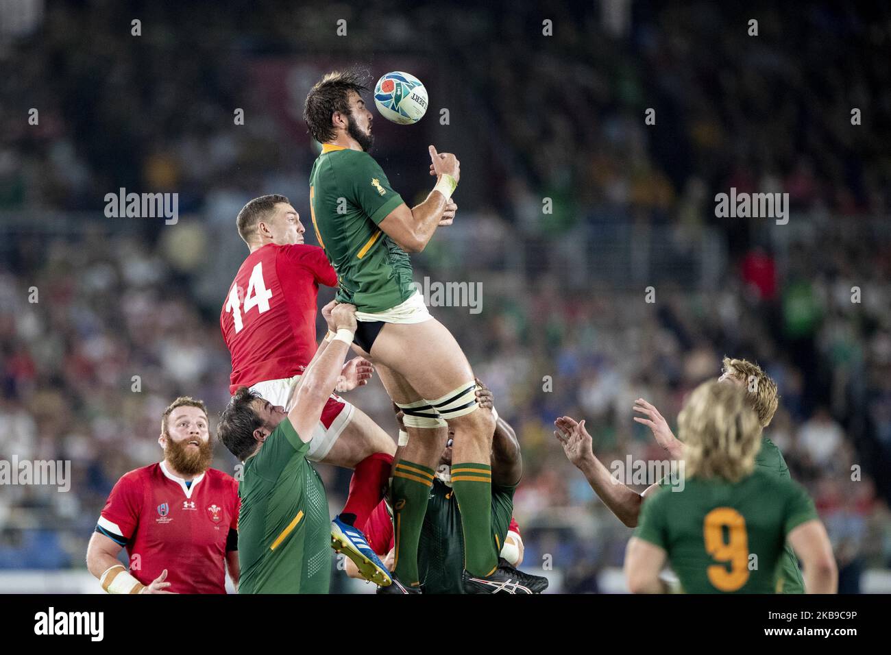 Justin Tipuric of Wales and Lood De Jager of South Africa competes for ...