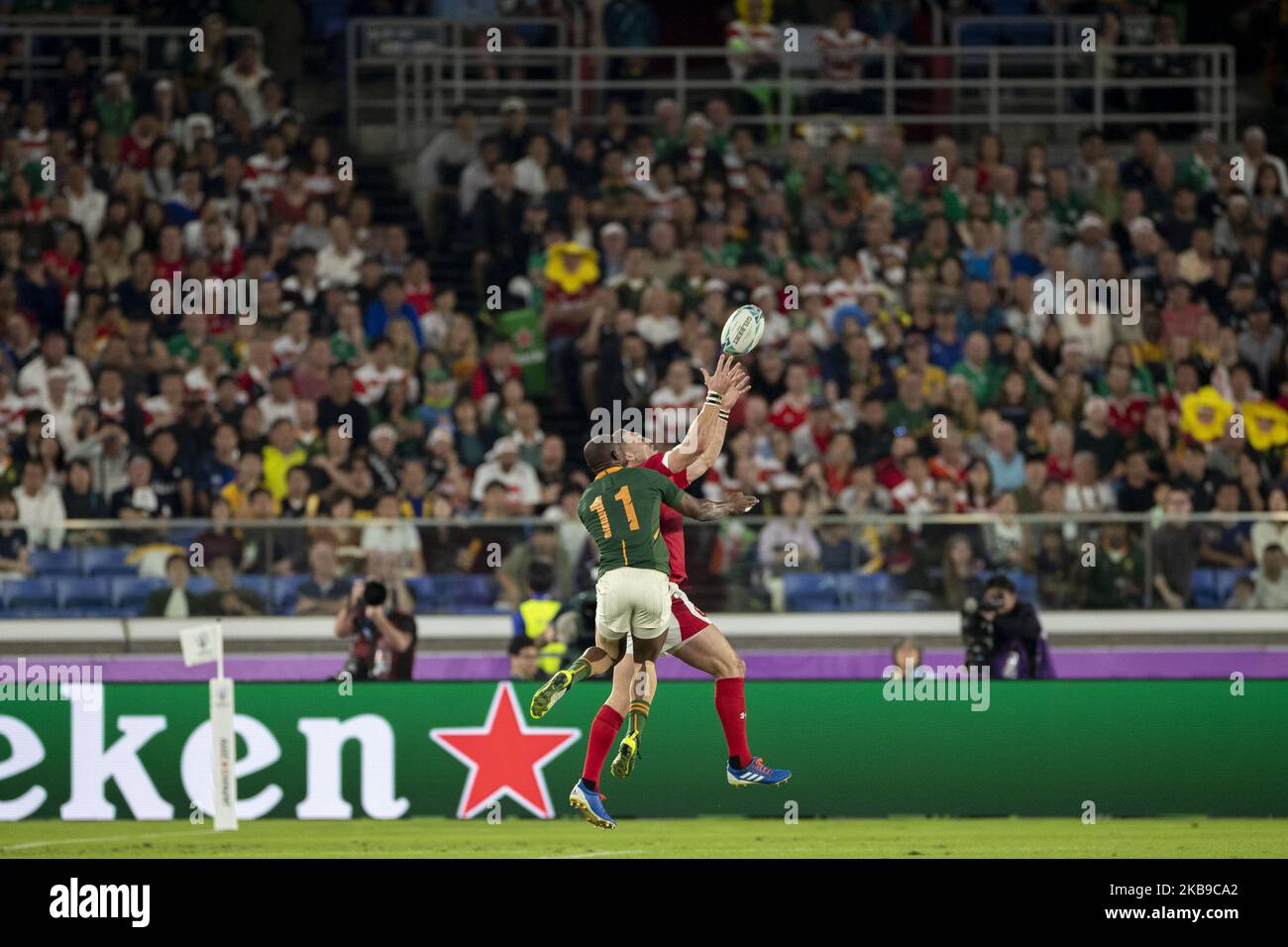Gareth Davies of Wales battles for high ball with Makazole Mapimpi of ...