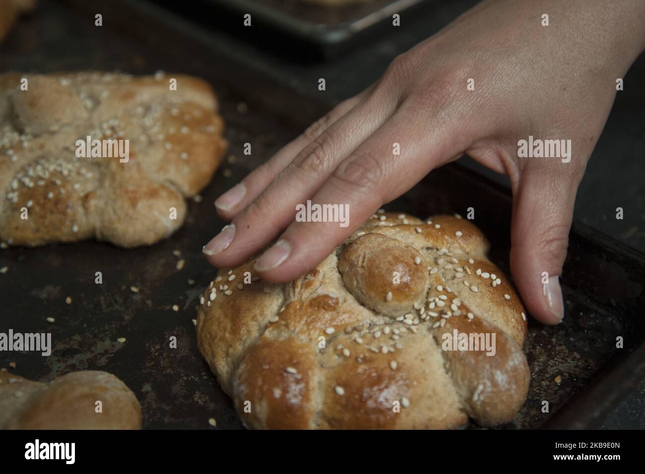 Members of a family in the municipality of Santa Ana Chiautempan, are ...