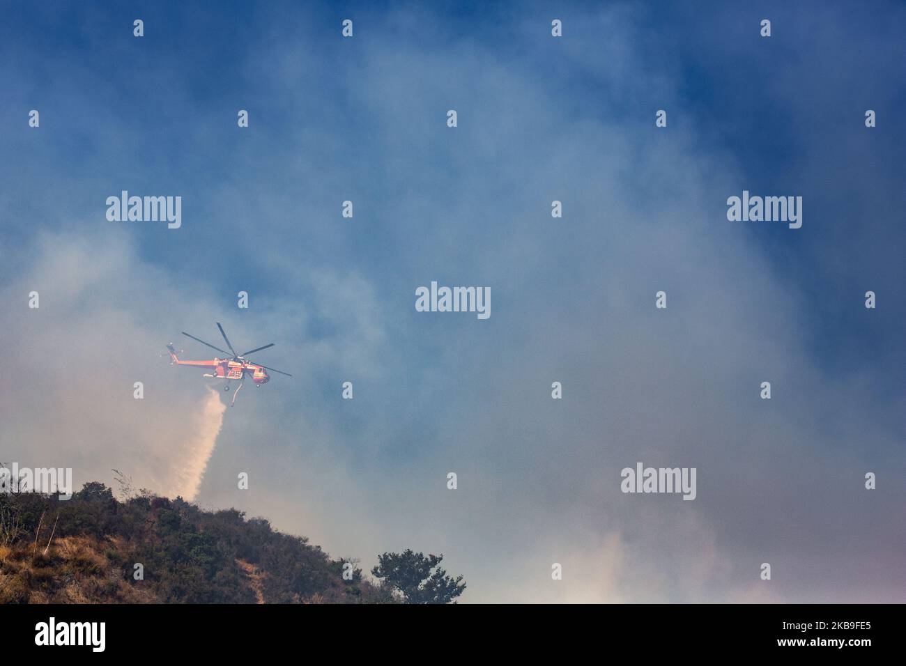 A wildfire burns near the prestigious Getty Museum located in the ...
