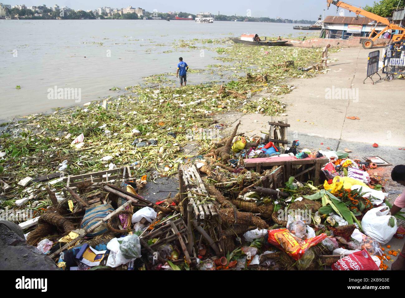 The idols thrown into the river Hooghly by Hindu devotees Monday during ...