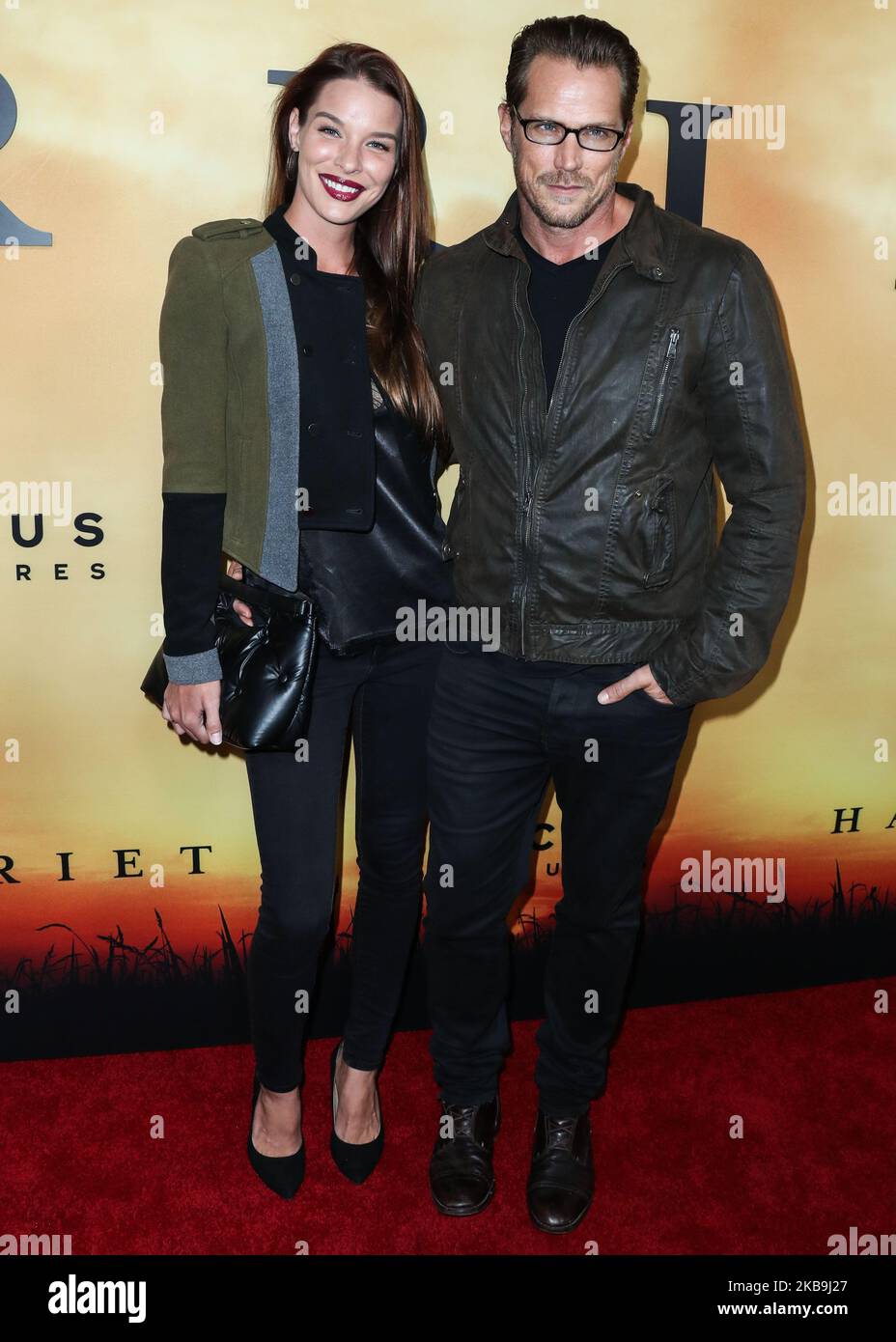 LOS ANGELES, CALIFORNIA, USA - OCTOBER 29: Liz Godwin and Jason Lewis ...