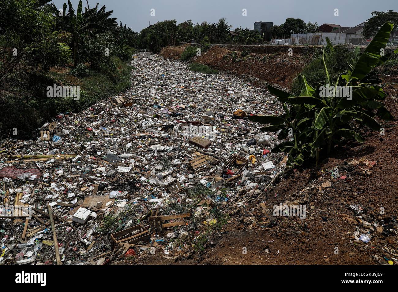 A view of a river covered by garbage in Bekasi, West Java, Indonesia ...