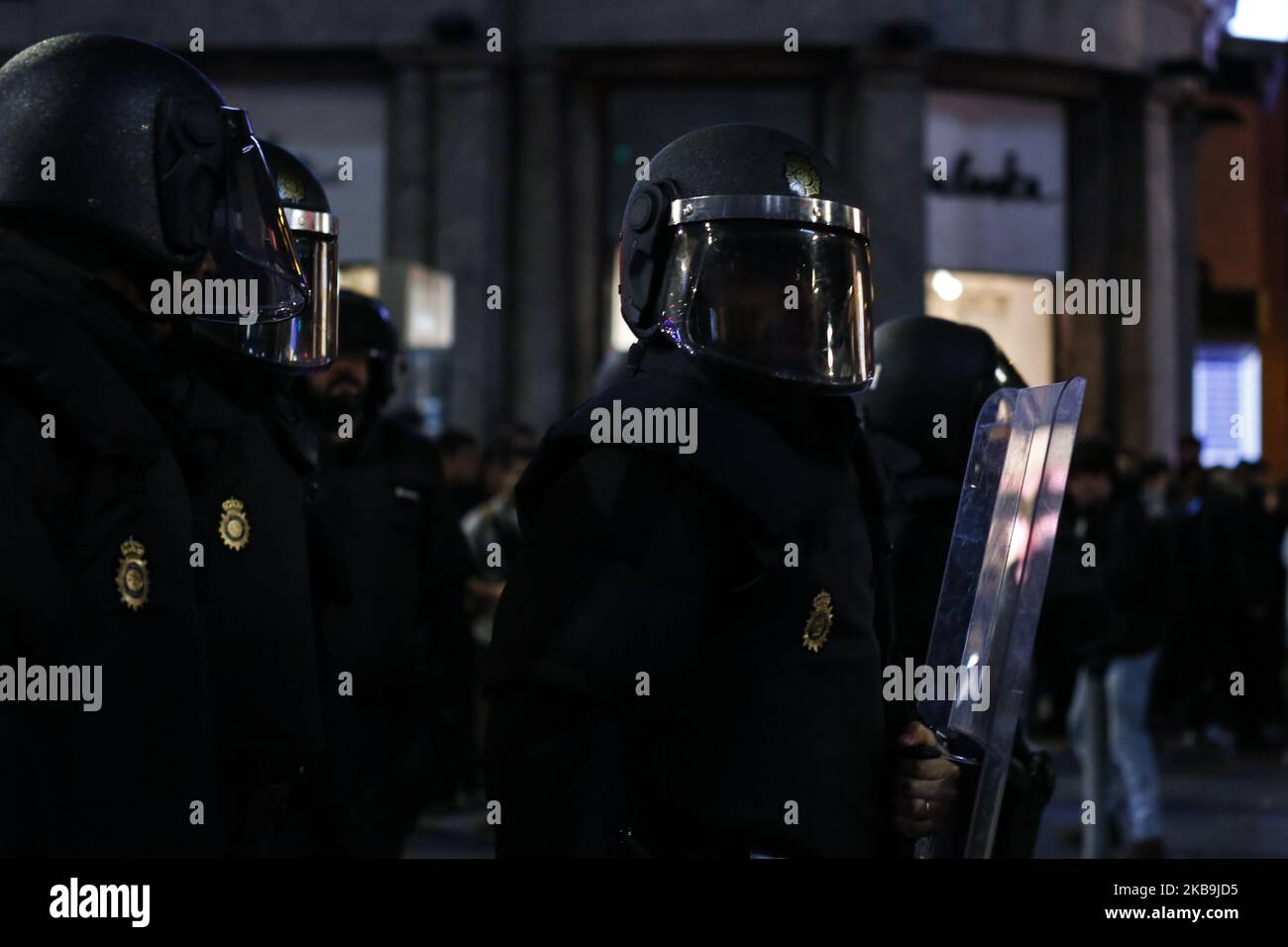 Spanish riot police officers are seen moments before the clashes ...