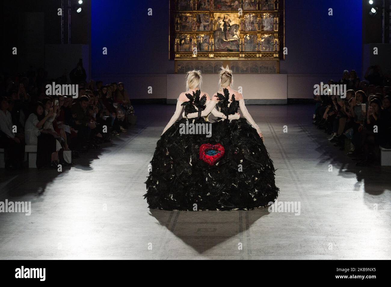 Models walk the runway during Guo Pei's first ever runway show in the ...