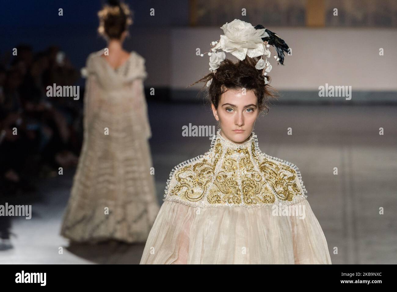 A model walks the runway during Guo Pei's first ever runway show in the ...