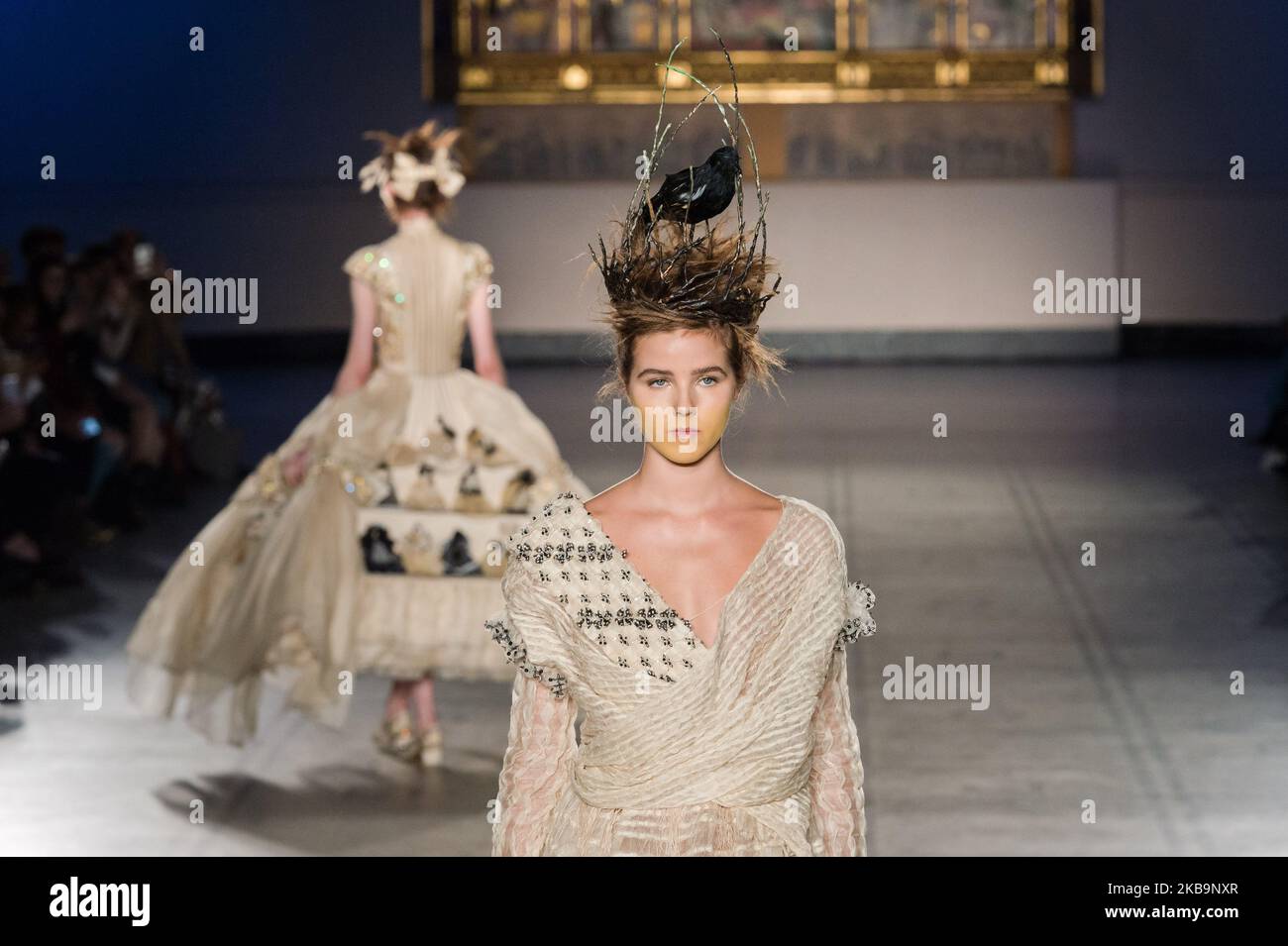 A model walks the runway during Guo Pei's first ever runway show in the ...