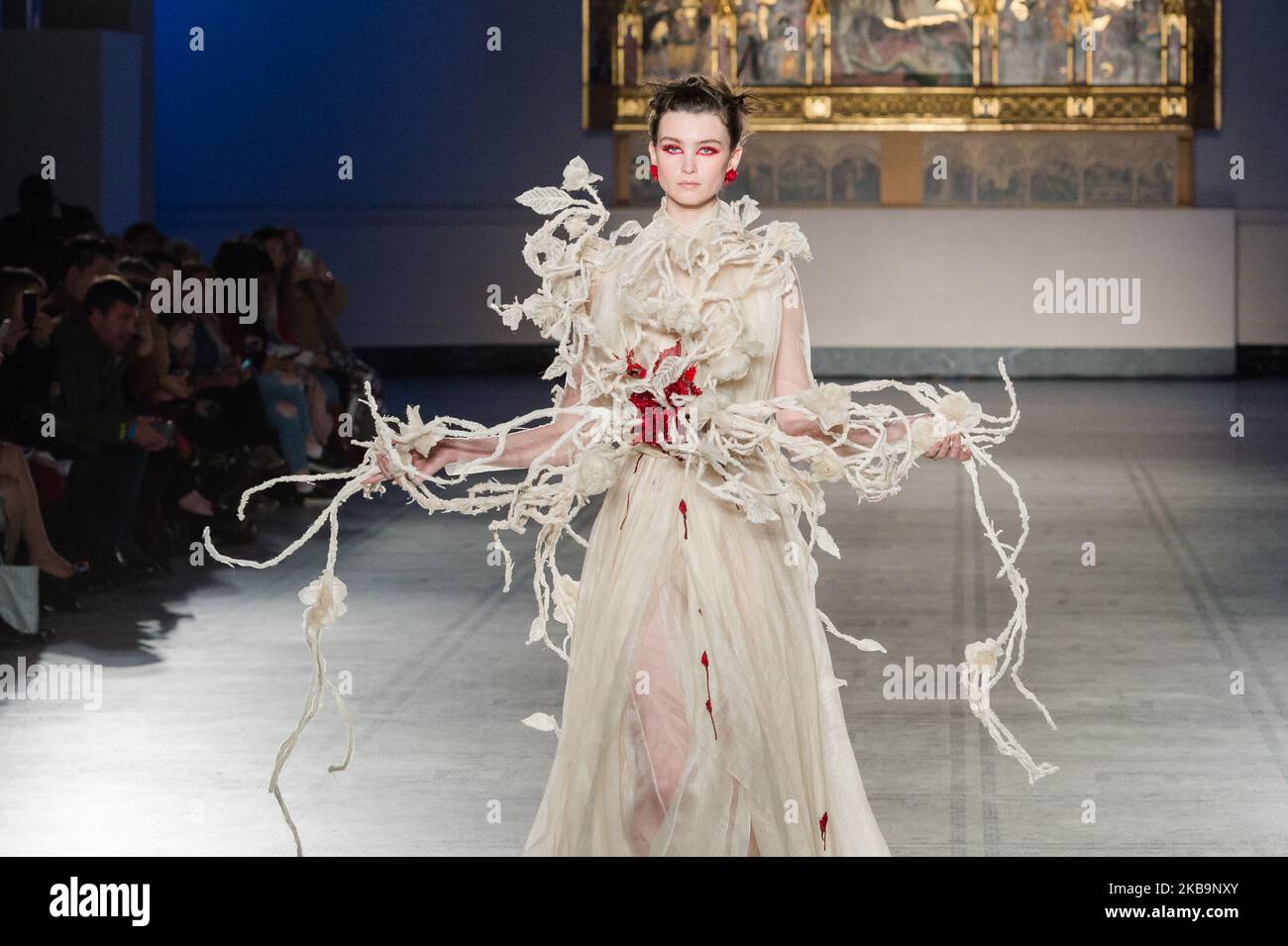 A model walks the runway during Guo Pei's first ever runway show in the ...