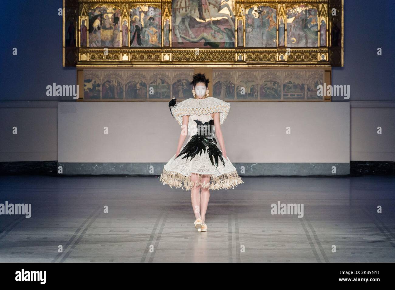 A model walks the runway during Guo Pei's first ever runway show in the ...