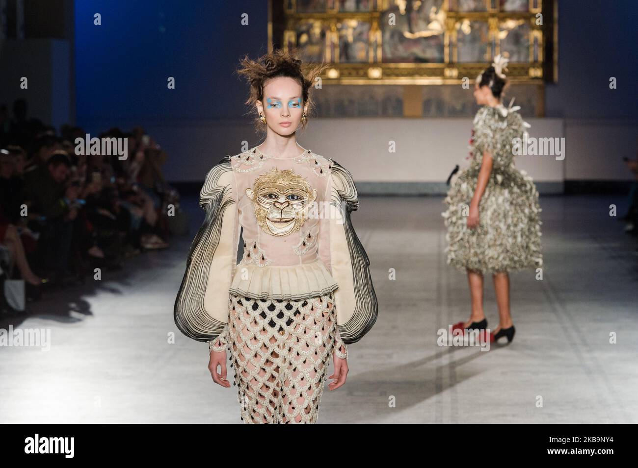 Models walk the runway during Guo Pei's first ever runway show in the ...
