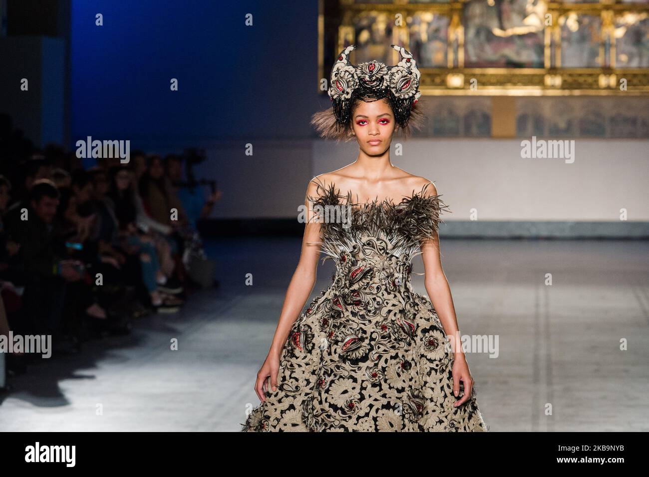 A model walks the runway during Guo Pei's first ever runway show in the ...