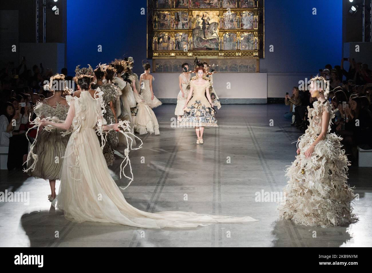 Models walk the runway during Guo Pei's first ever runway show in the ...