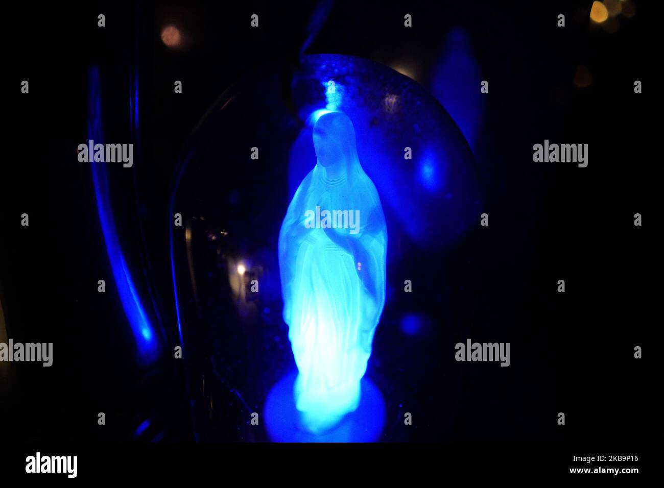 An effigy of the the Virgin Mary is seen on a gravestone at the Brodno ...