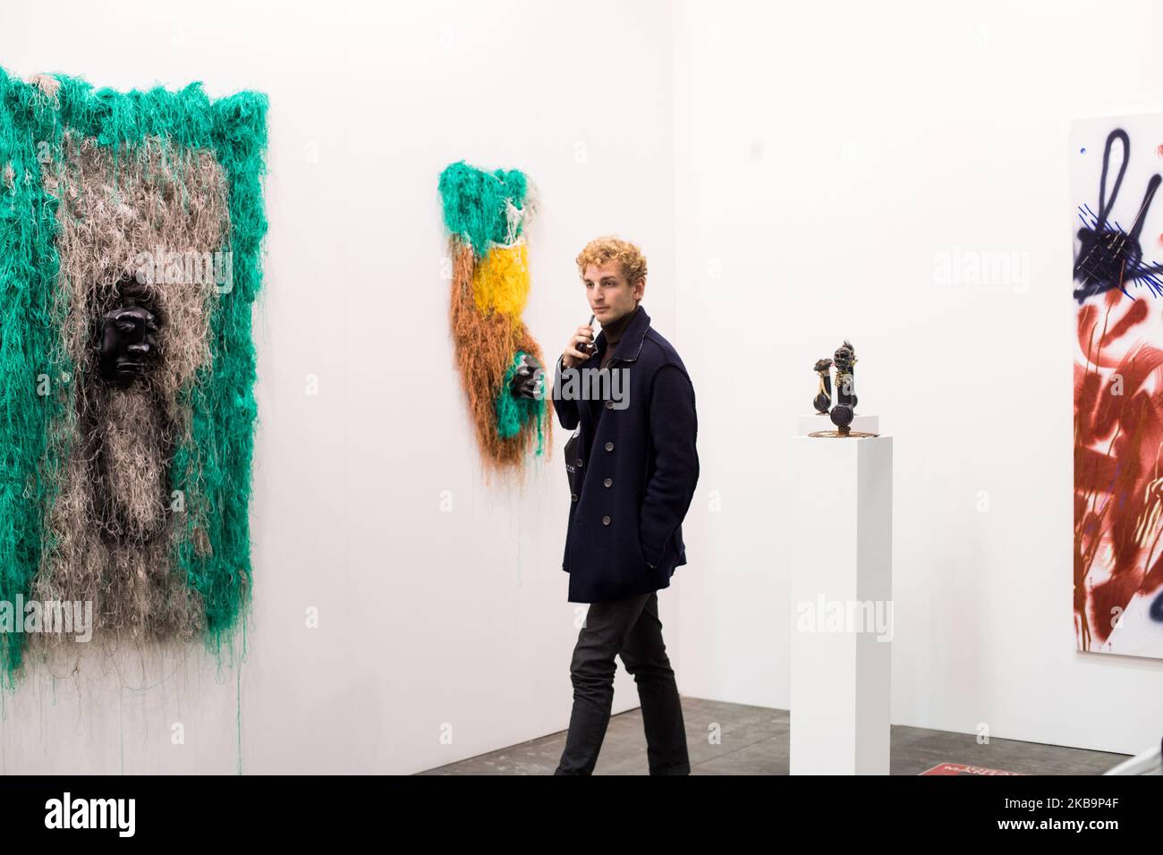 Visitors admire the work of the artists of the Thomas Schulte (Berlin ...