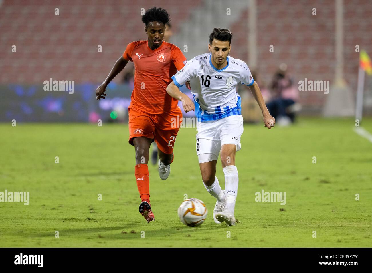 Al Wakrah's Khalid Muneer A A Mazeed under pressure from Yusuf ...