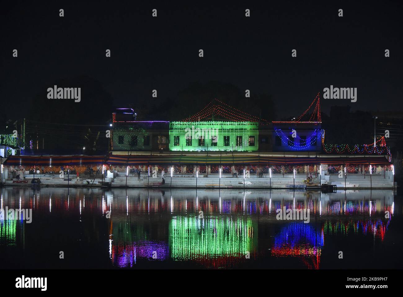 An illuminated view of Ganga Sagar lake for the celebration of Chhath ...