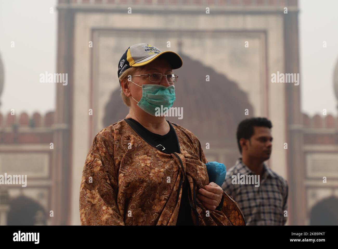 A foreigner wears a mask inside the premises of Jama Masjid (Grand ...