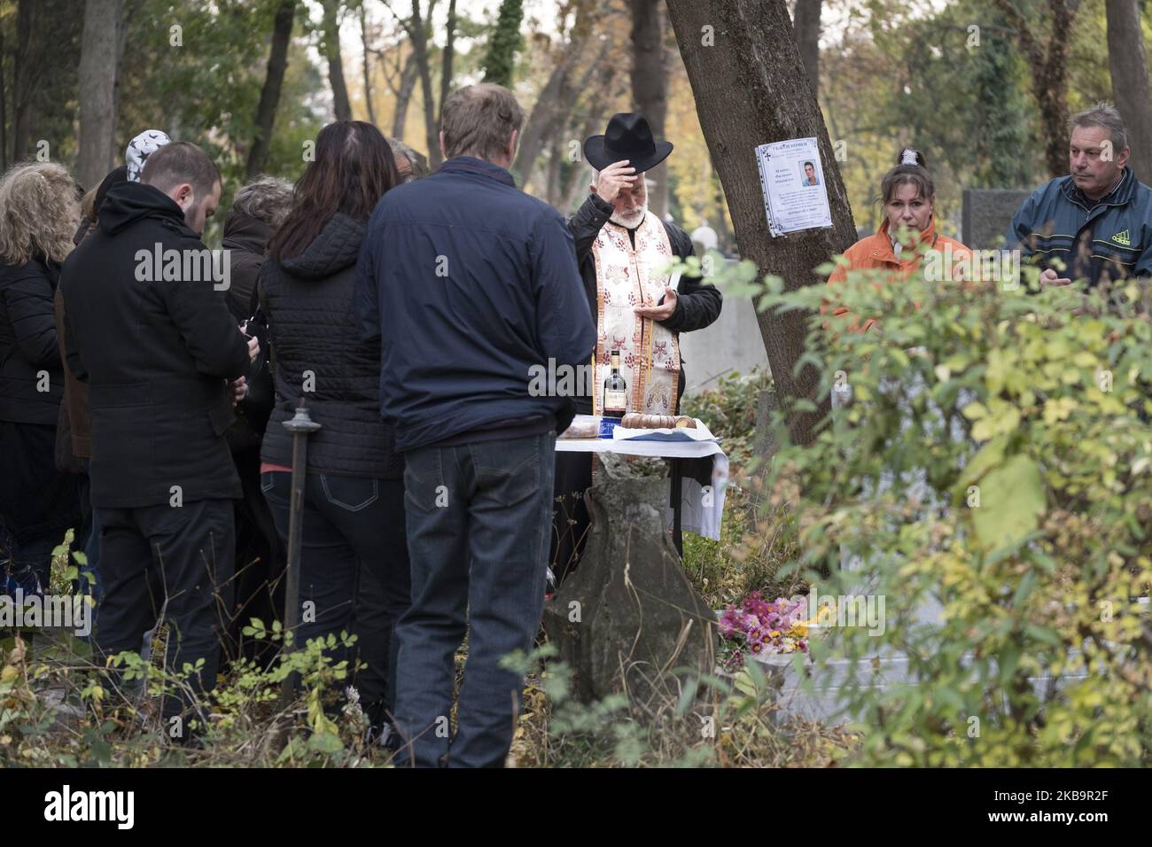 A graveside ceremony is held during All Soul's Day, when Bulgarian ...
