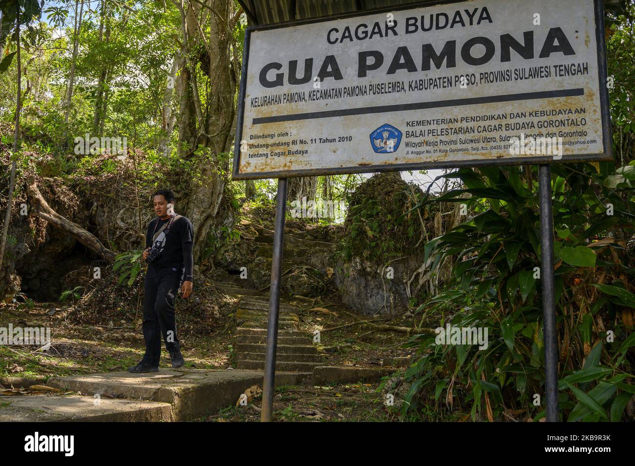 Poso, Central Sulawesi, Indonesia (November 2): A visitor walks near ...