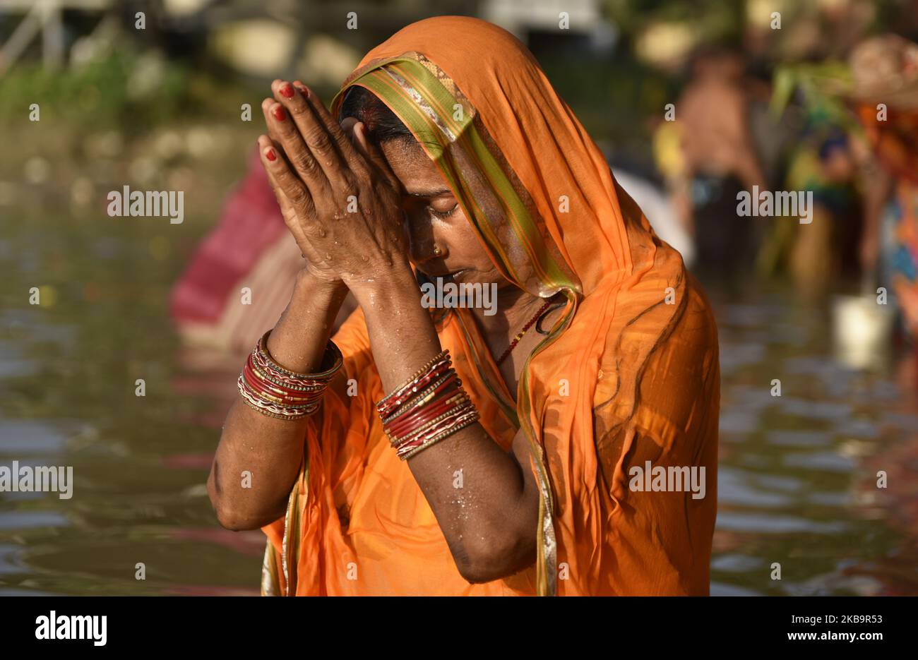 Devotees perform Chhath Puja rituals during sunset, on November 02 ...