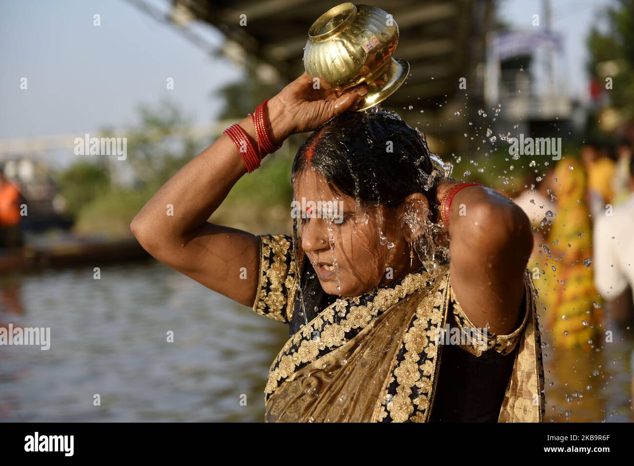 Devotees perform Chhath Puja rituals during sunset, on November 02 ...