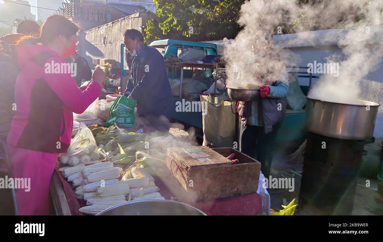 The busy morning market with all kinds of fruits and vegetables in ...