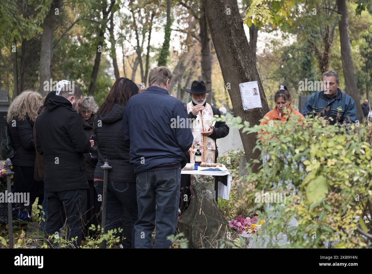 A graveside ceremony is held during All Soul's Day, when Bulgarian ...