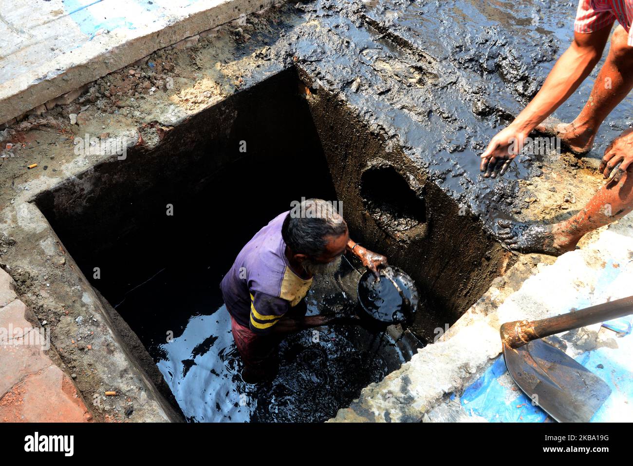 Man Cleaning Sewer