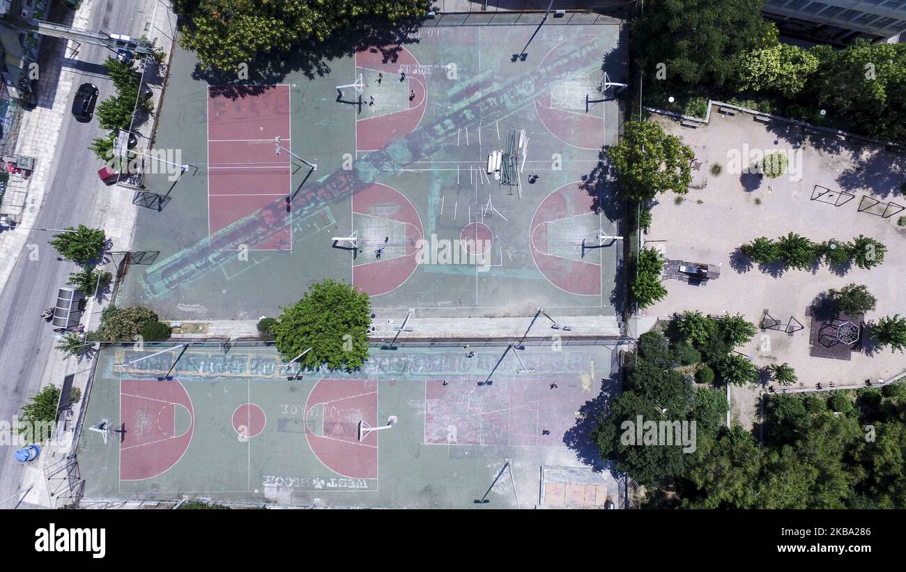 Kids are training at a basketball country near Apostolos Nikolaidis ...