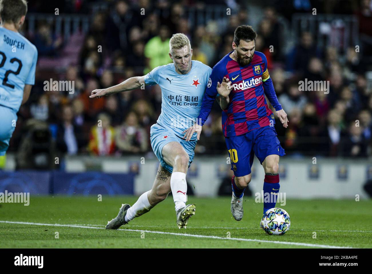 10 Lionel Messi from Argentina of FC Barcelona defended by 23 Sevick of ...