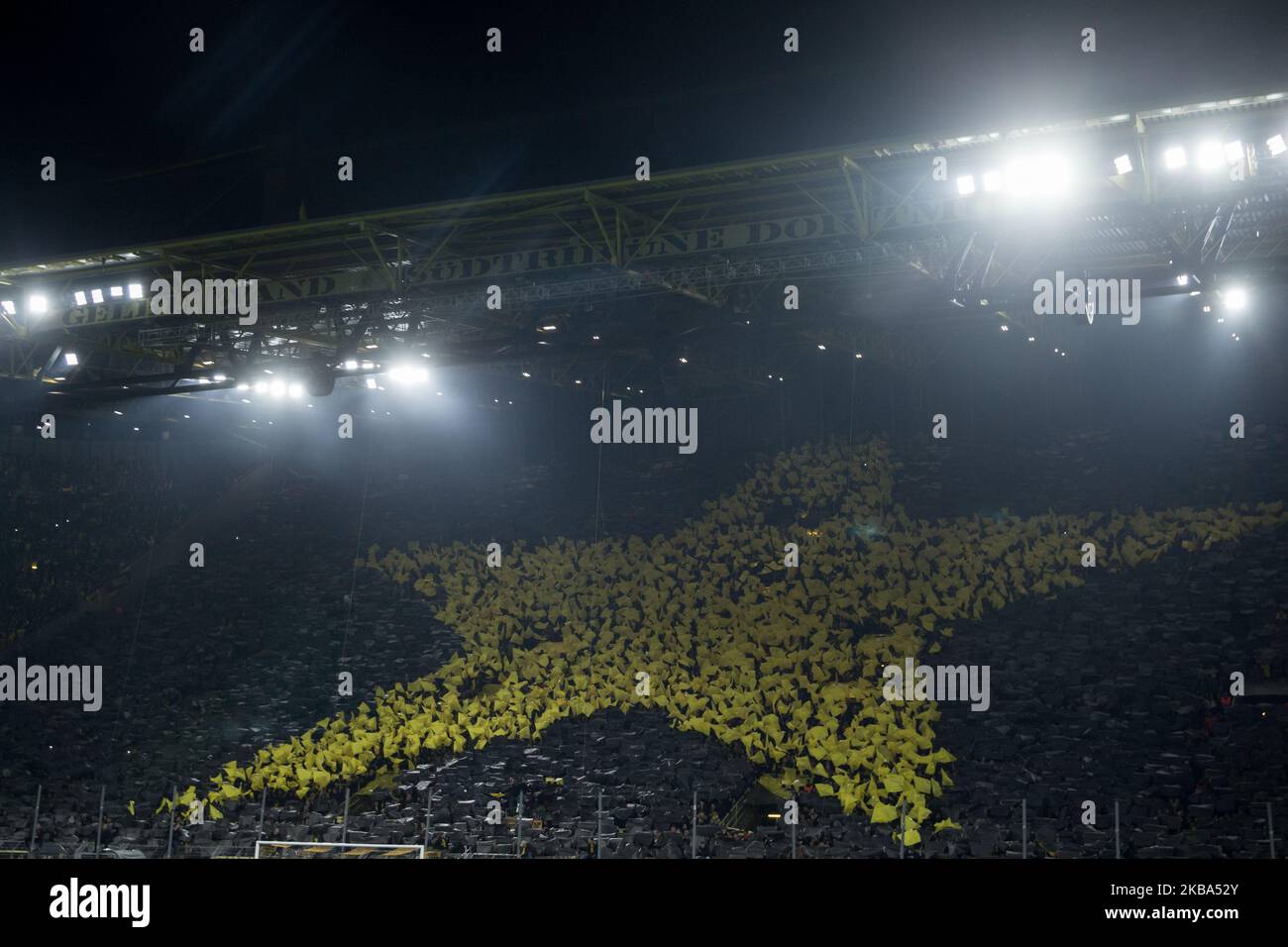 Borussia dortmund fans support their team hi-res stock photography and ...