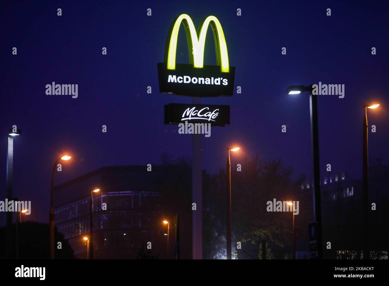 McDonald's and McCafe logos are seen near the restaurant in Krakow ...