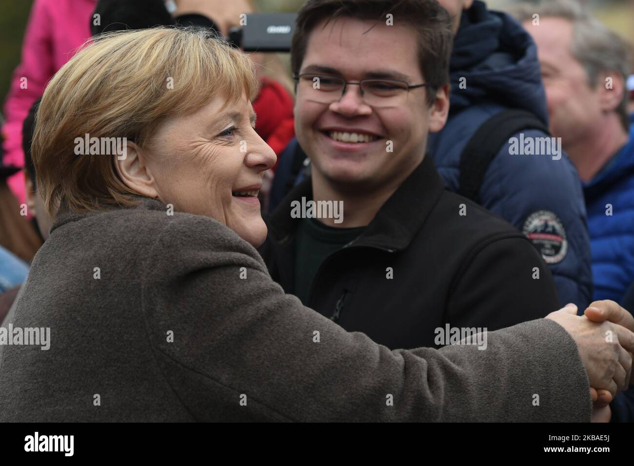 Angela Merkel, Germany's Chancellor, meets members of the public ...