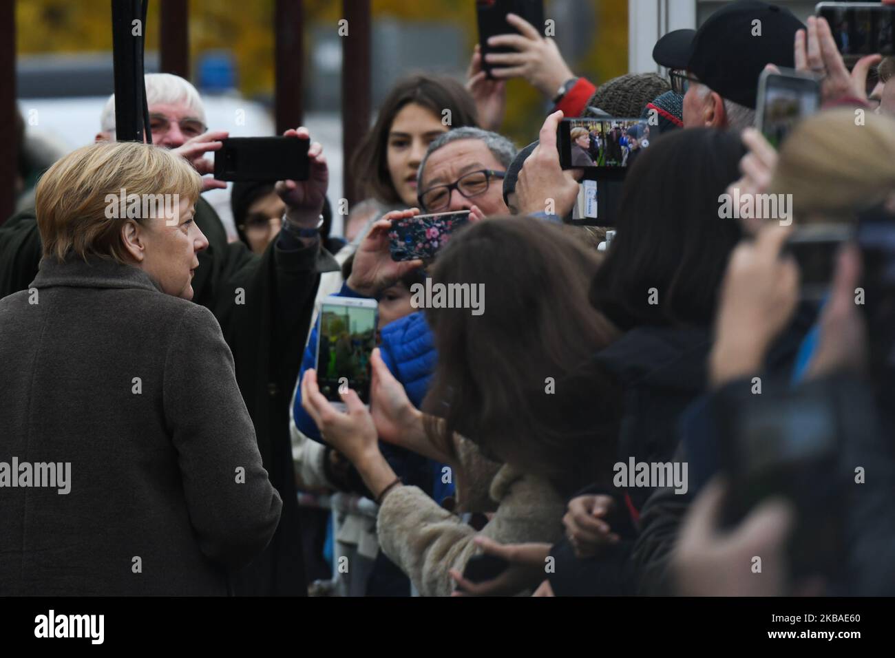 Angela Merkel, Germany's Chancellor, meets members of the public ...