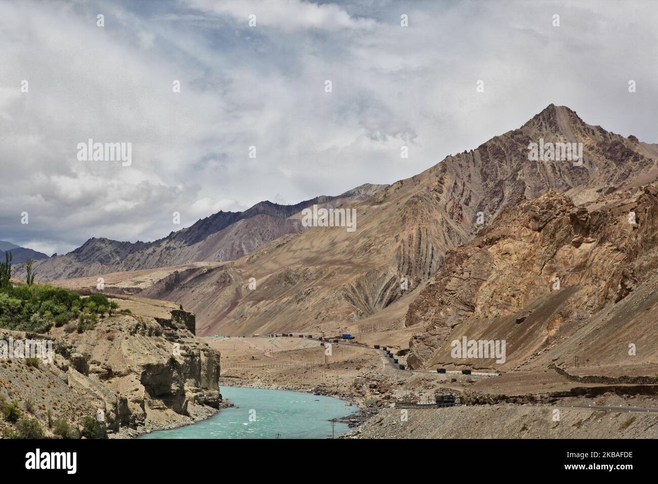 River cuts through the mountainous landscape in the Khaltse Village in ...
