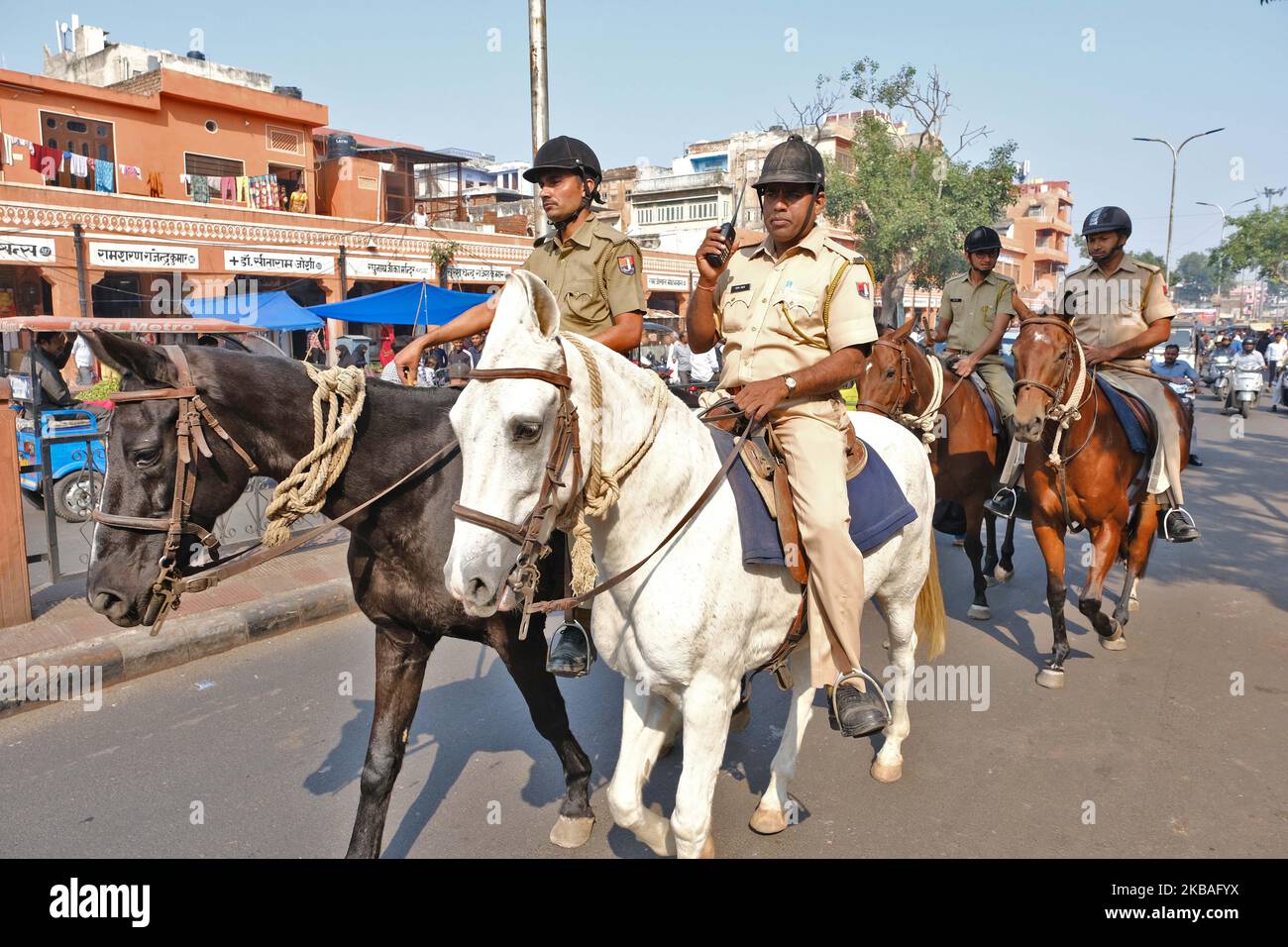 Security personnel patrol a street as a precautionary measure in view ...