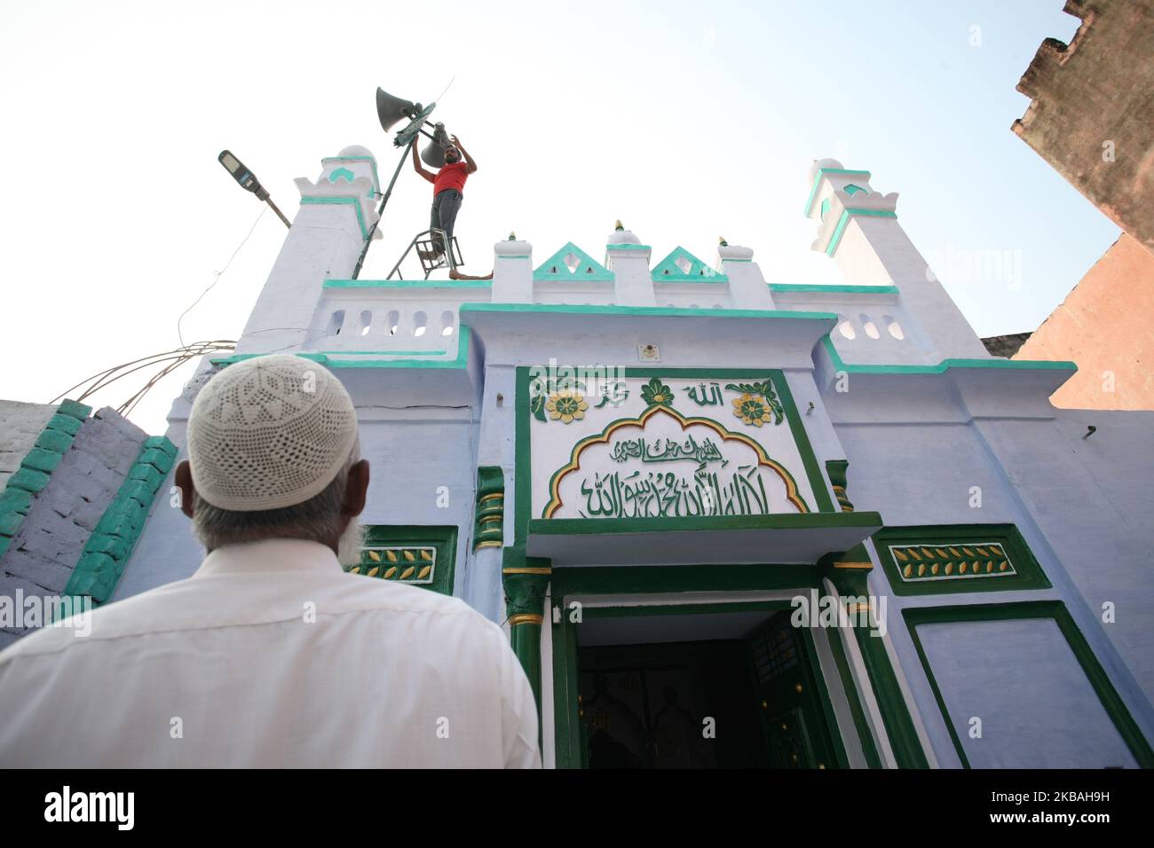 An indian muslim man stand outside of a mosque ,one day after Supreme ...